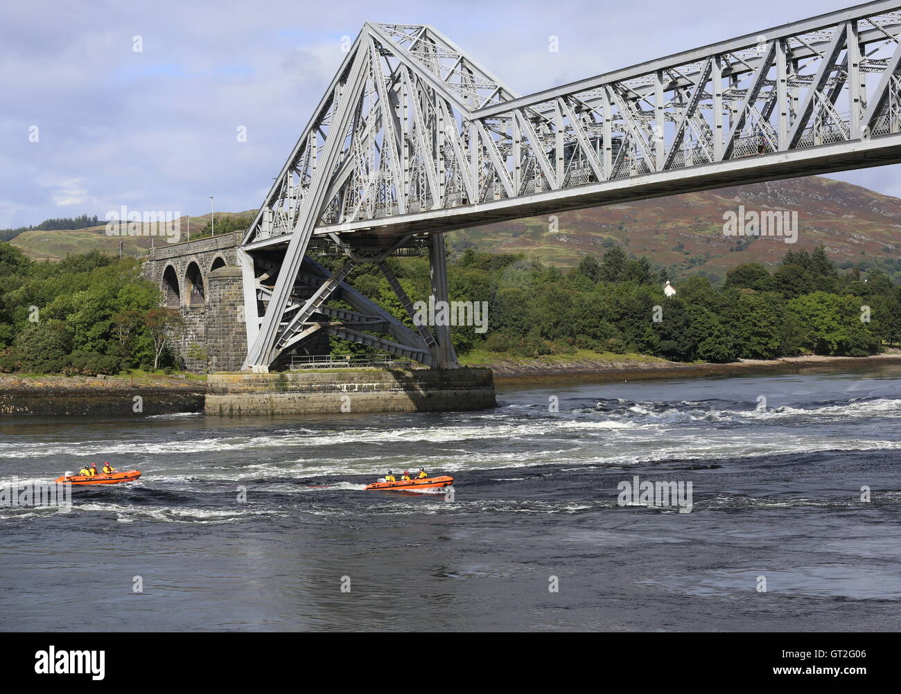 Rib boats on Falls of Lora under Connel Bridge Scotland September 2016 ...