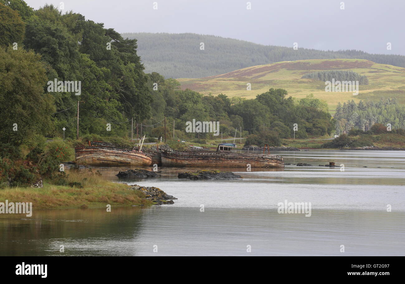 Derelict boats and ruin of Aros castle near Salen Isle of Mull Scotland ...