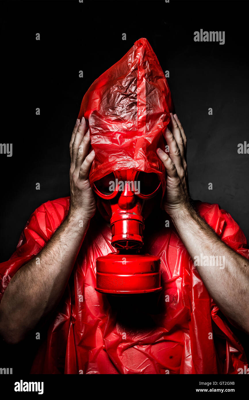 Horror concept, man with red gas mask Stock Photo - Alamy