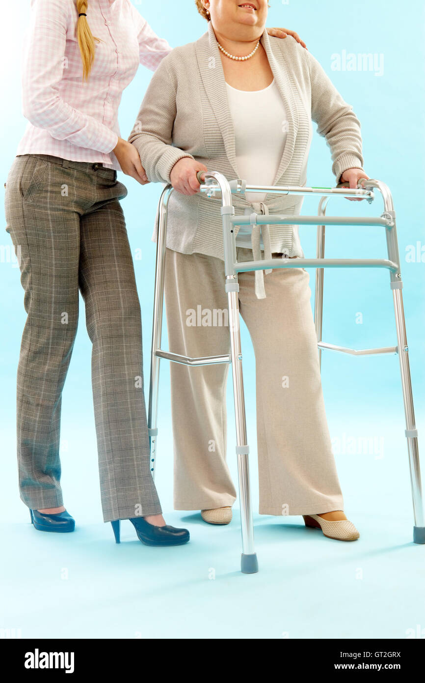 Walking with walker Stock Photo - Alamy