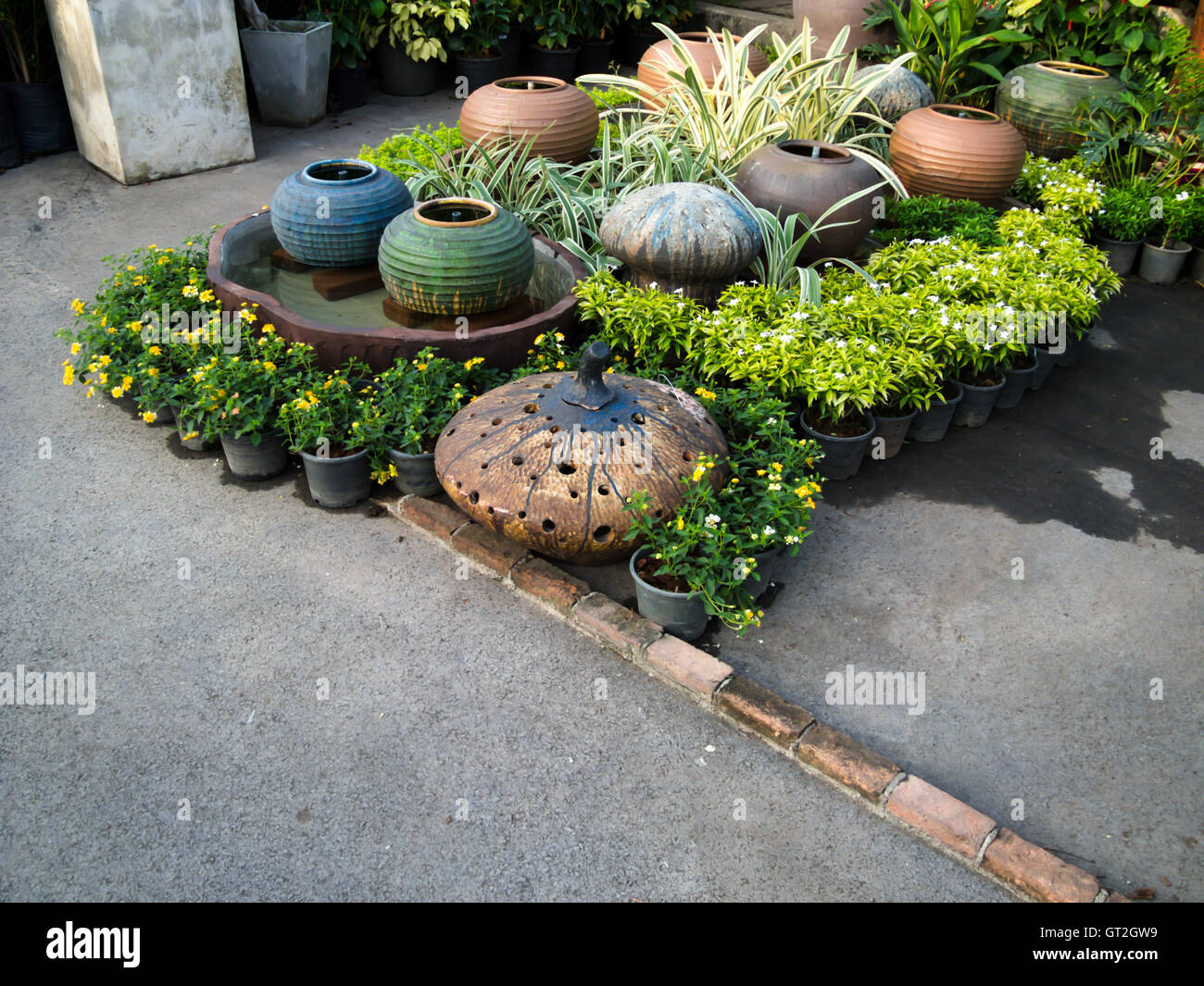 water jar in garden Stock Photo - Alamy