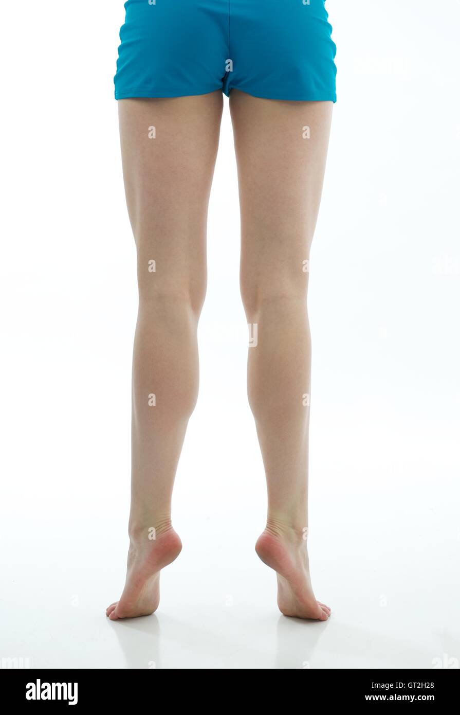 Dancer's Muscular Legs with Blue Shorts Stock Photo - Alamy