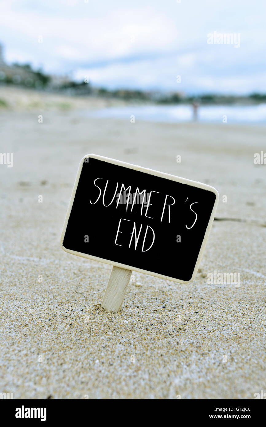 closeup of a black signboard with the text summers end written in it ...