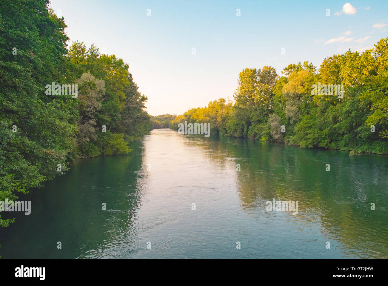 Quiet river trees and clouds Stock Photo - Alamy