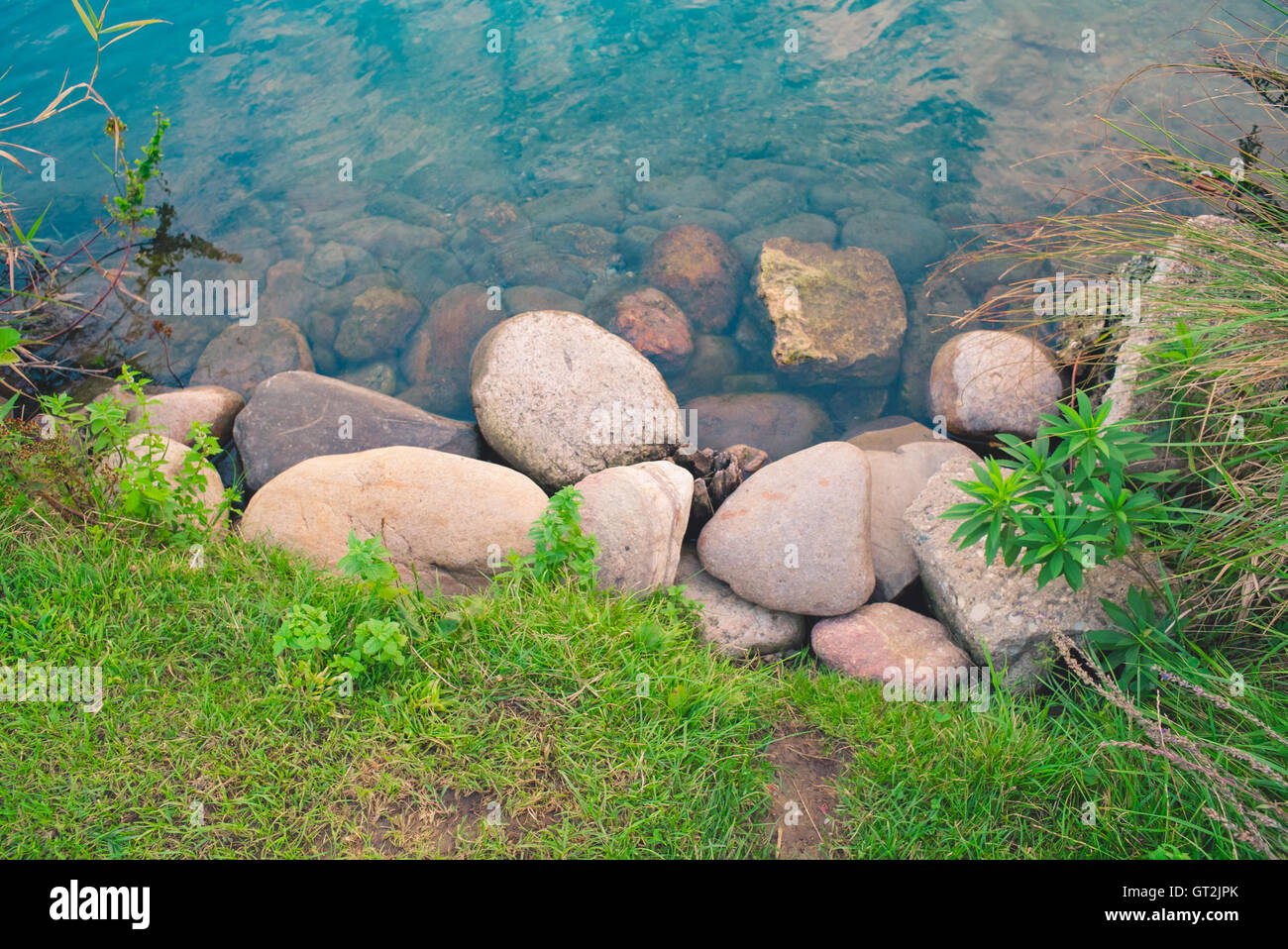 Grass trees lake rocks hi-res stock photography and images - Alamy