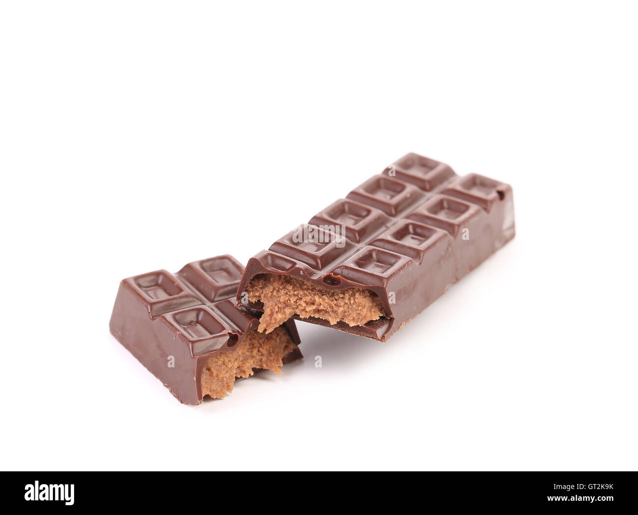 Broken chocolate bar with filling Stock Photo - Alamy