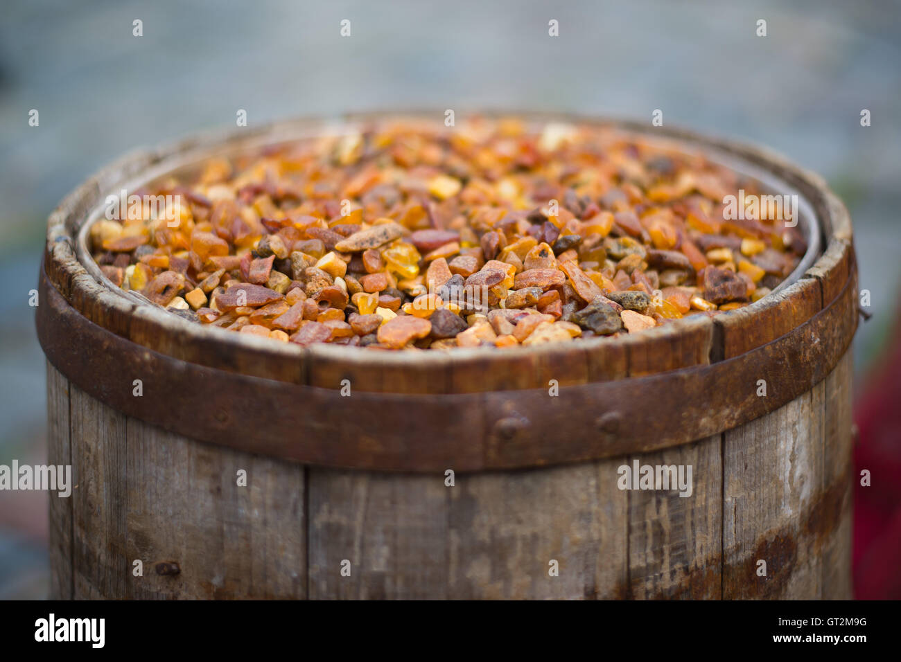 old barrel filled with amber Stock Photo - Alamy