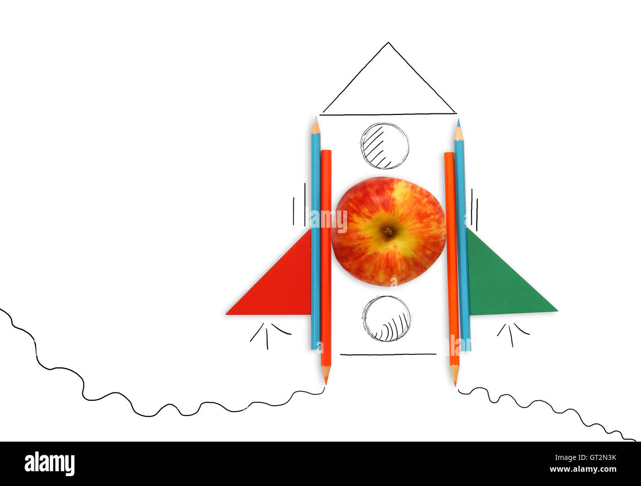 concept of idea and creativity. apple and pencils creating rocket ...
