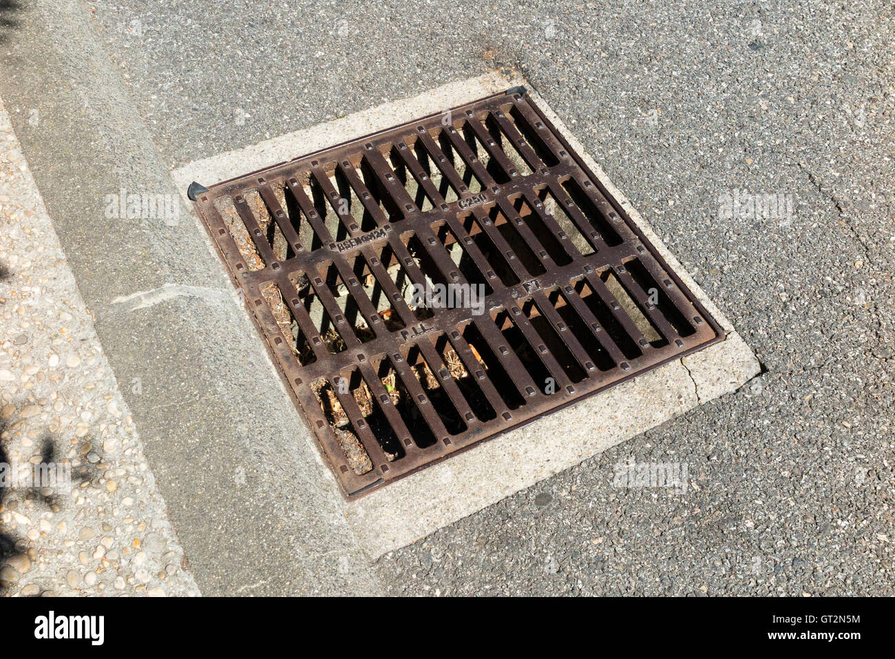 Dangerous drain grid iron cover placed with slots in same direction as ...