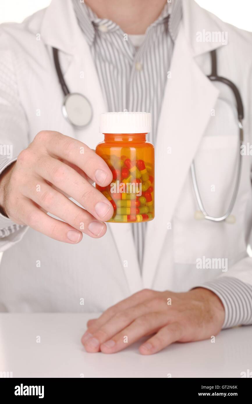 Doctor With Medication in Prescription Bottles Stock Photo - Alamy
