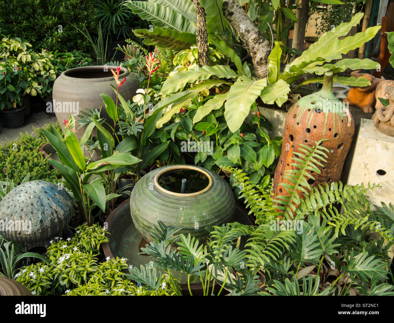 water jar in garden Stock Photo - Alamy