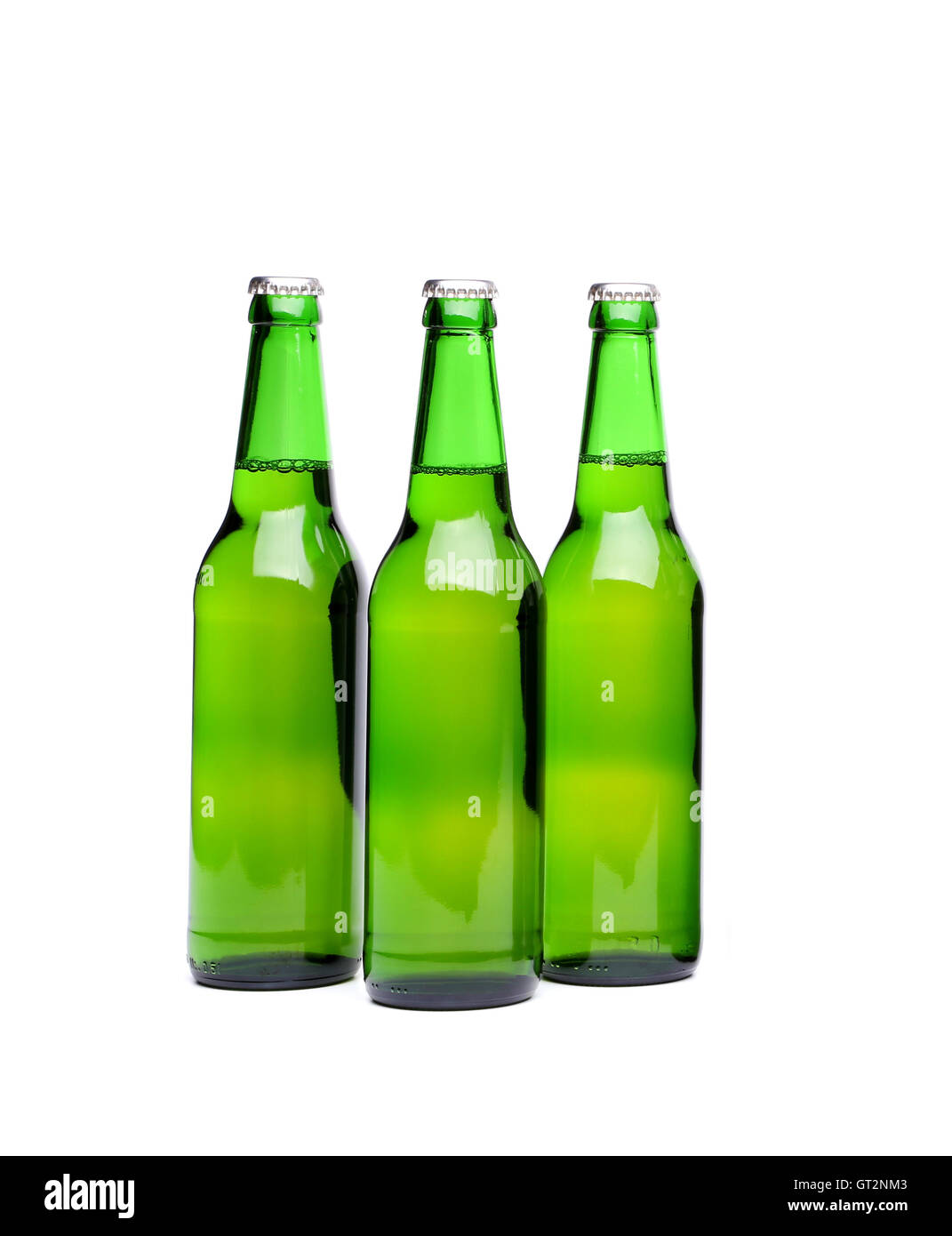 Three beer bottles. Isolated on white background Stock Photo - Alamy