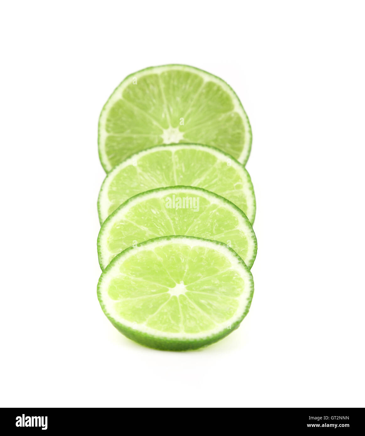 slices of lime, Isolated on white background Stock Photo - Alamy