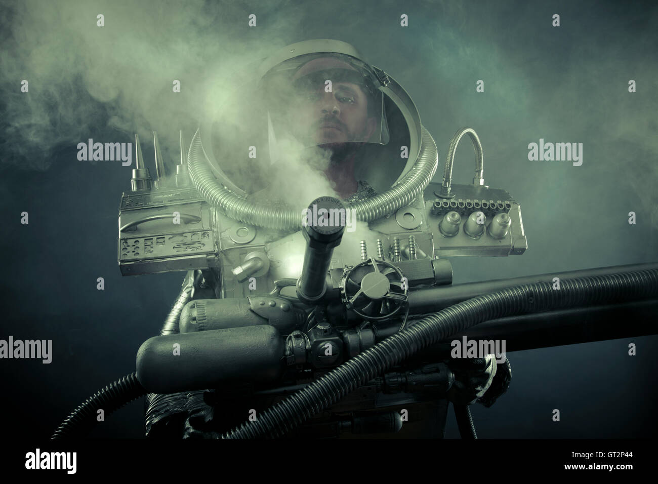 Futuristic pilot, fantasy warrior with huge space weapon Stock Photo ...