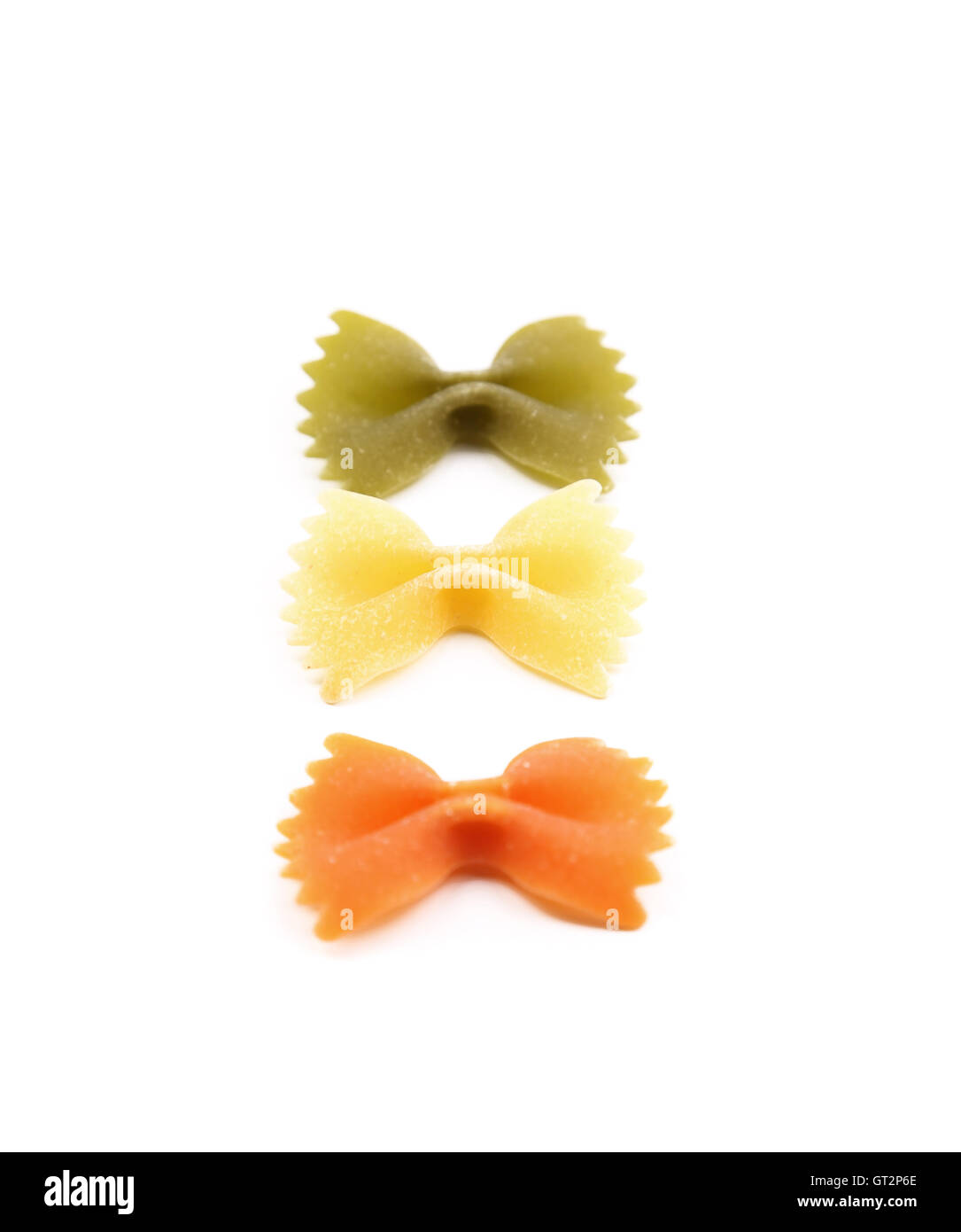 Farfalle pasta, isolated, three colors Stock Photo - Alamy