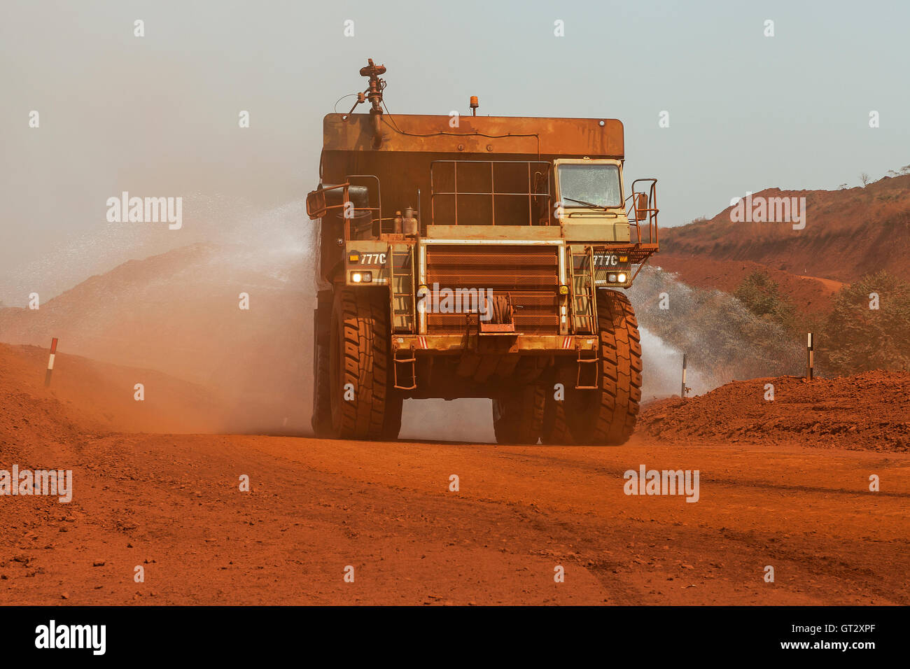 Mining operation for transporting and managing iron ore. Bowser truck ...