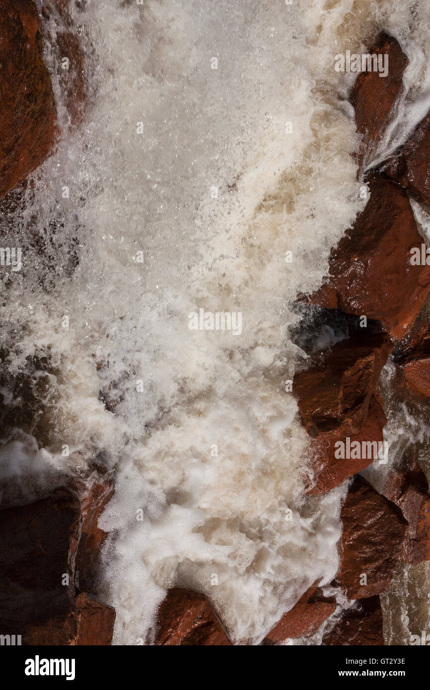 Mining operations for producing and managing iron ore. Newly built dam ...