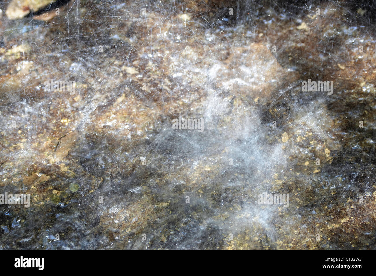 Splashing Water on Rocks Stock Photo - Alamy