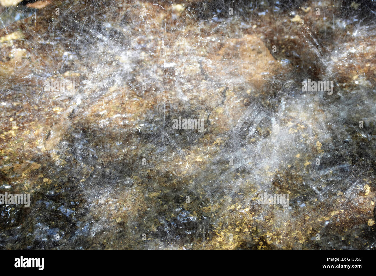 Splashing Water on Rocks Stock Photo - Alamy