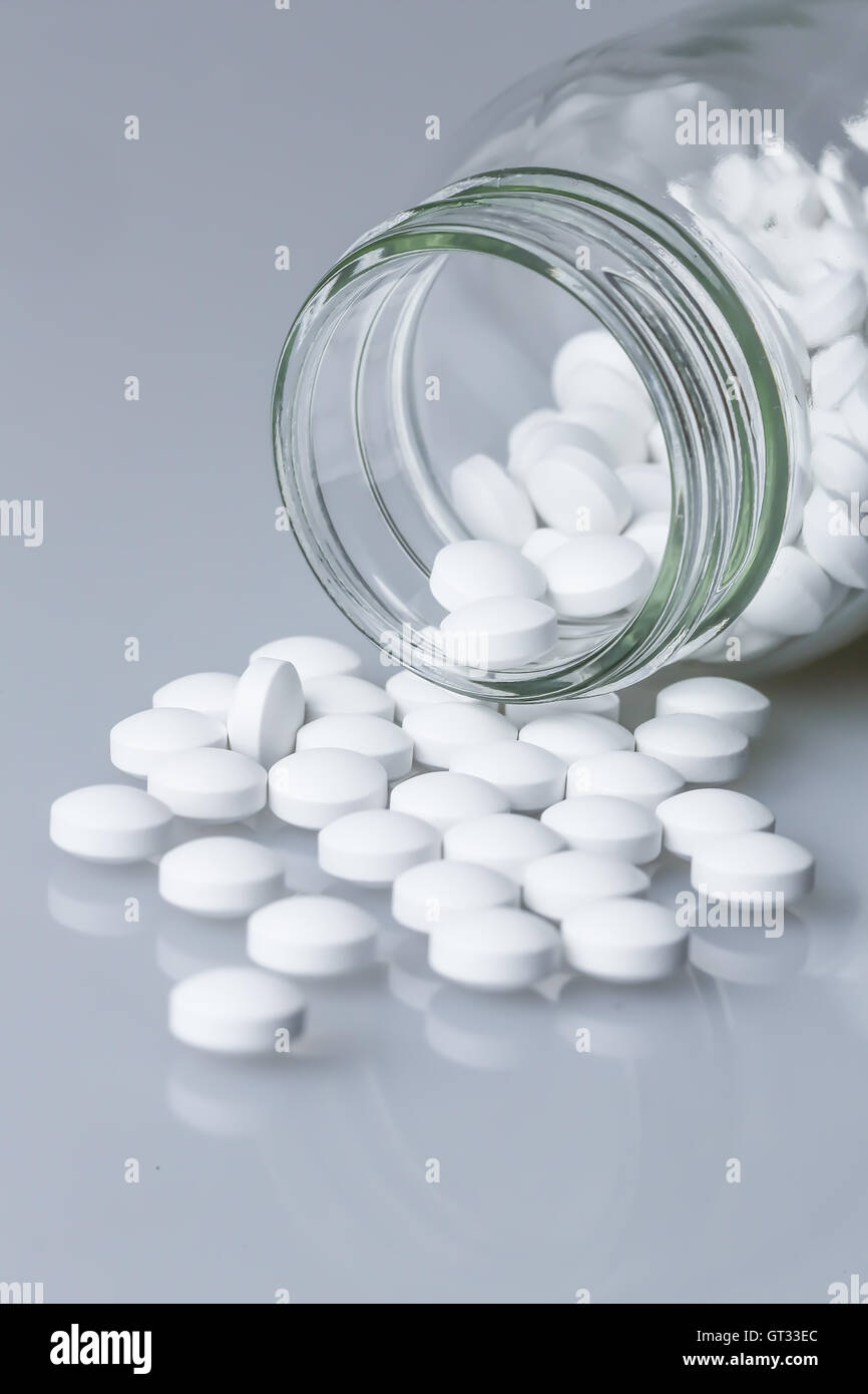 A bottle and tablets Stock Photo - Alamy