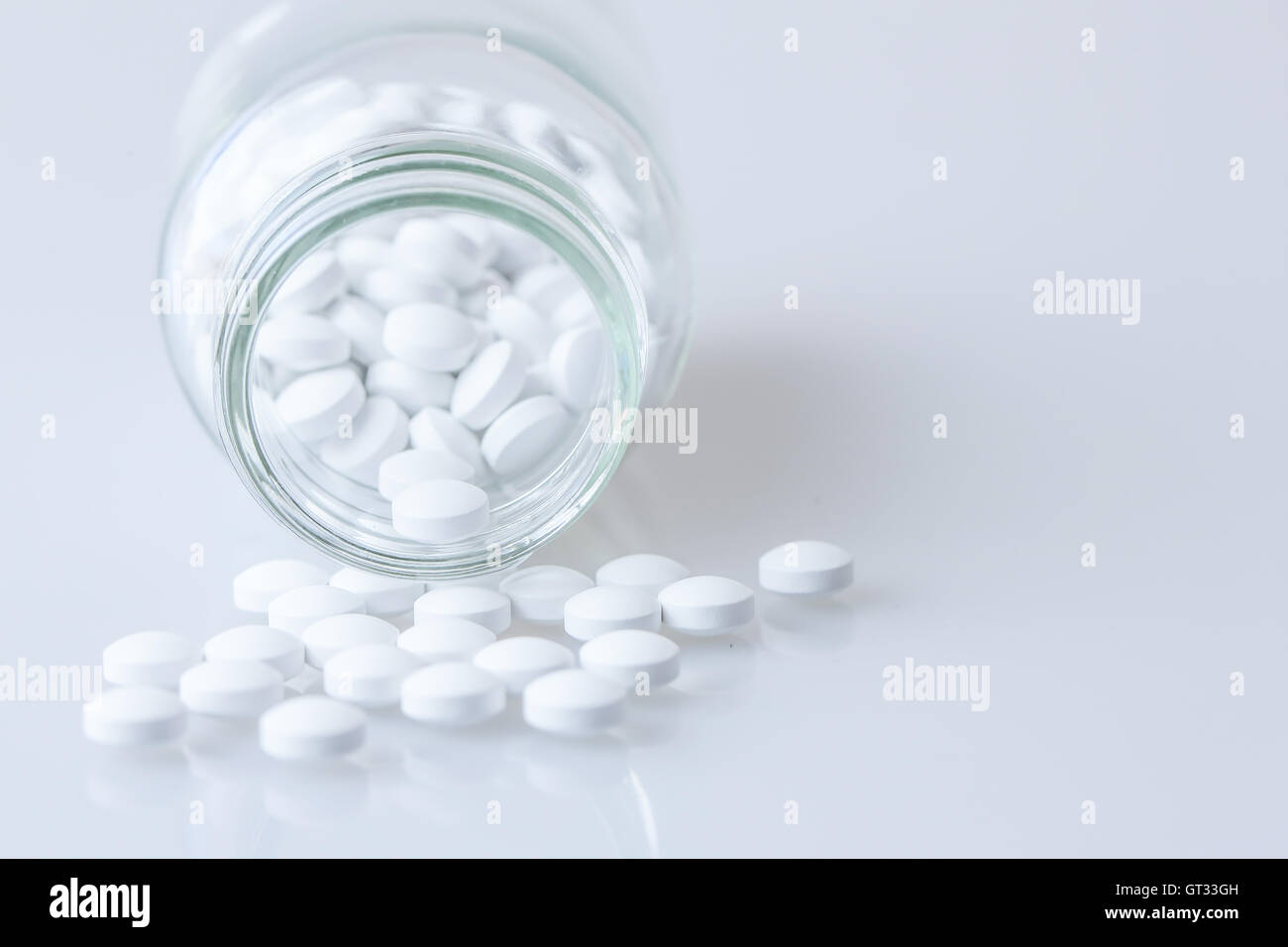 A bottle and tablets Stock Photo - Alamy