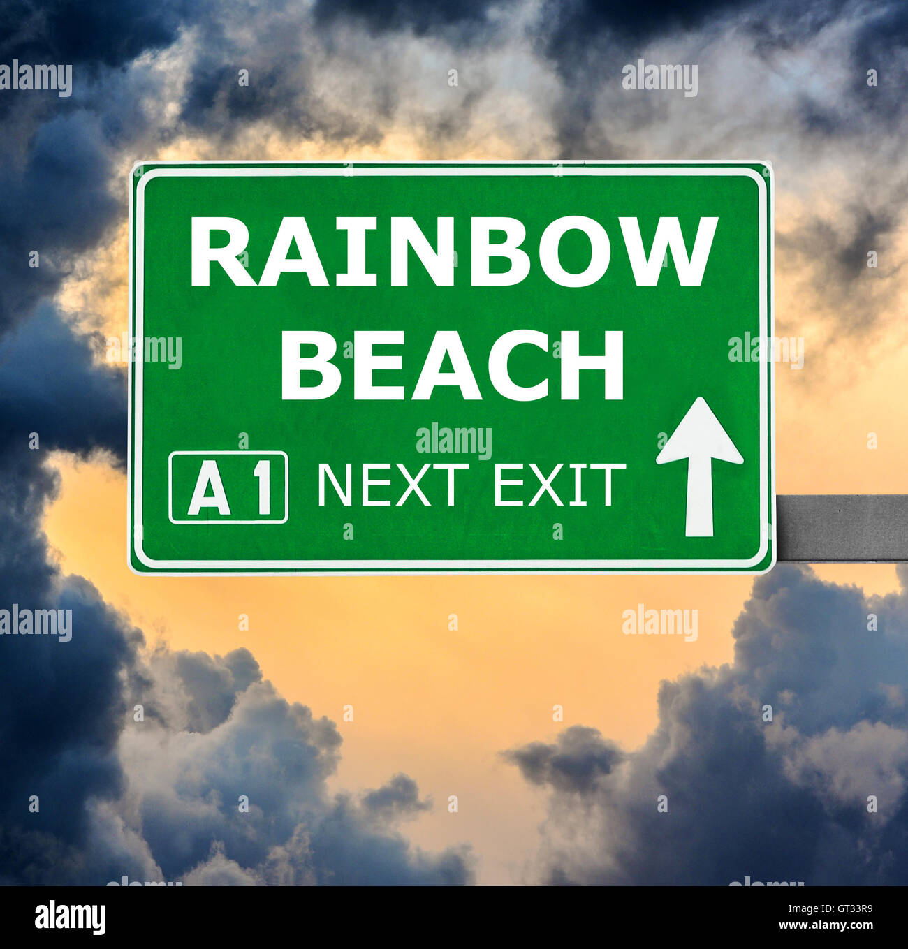 RAINBOW BEACH road sign against clear blue sky Stock Photo - Alamy