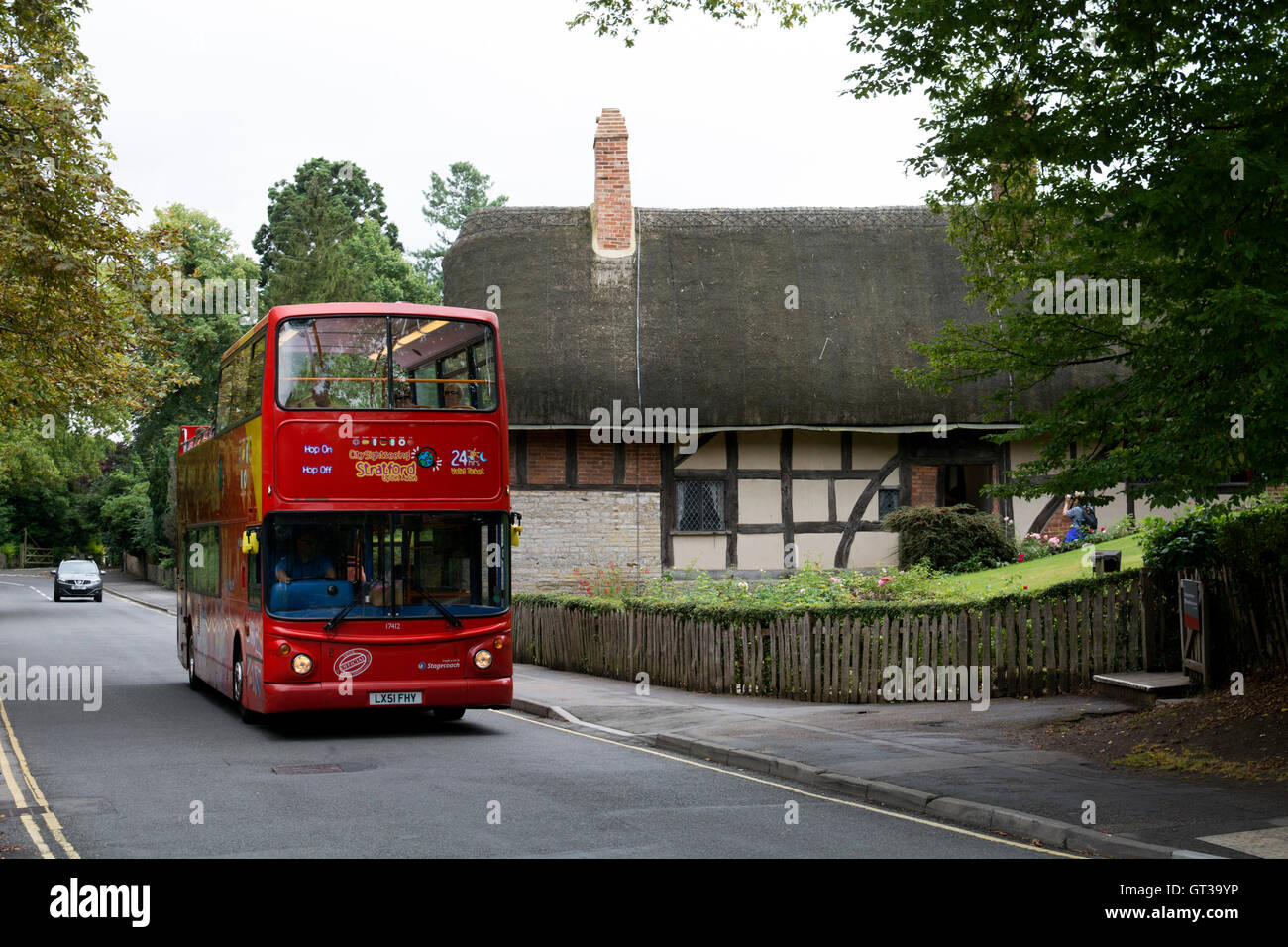 Stagecoach open top bus tour passing Anne Hathaway`s Cottage, Shottery ...