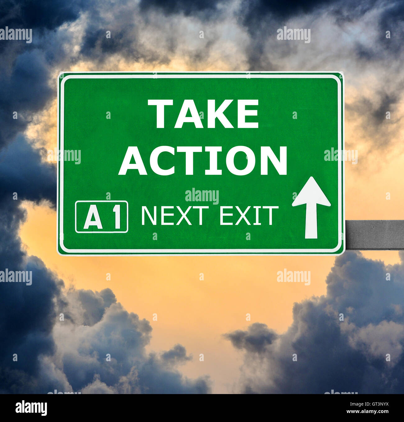 TAKE ACTION road sign against clear blue sky Stock Photo - Alamy