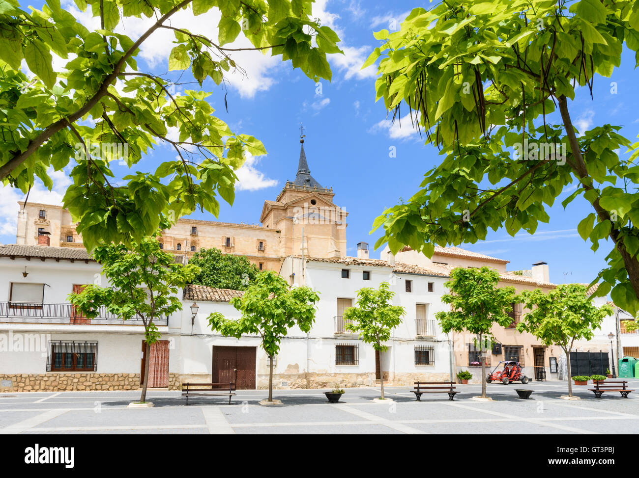 Pretty Plaza de Pelayo Quintero overlooked by the Monasterio de ...