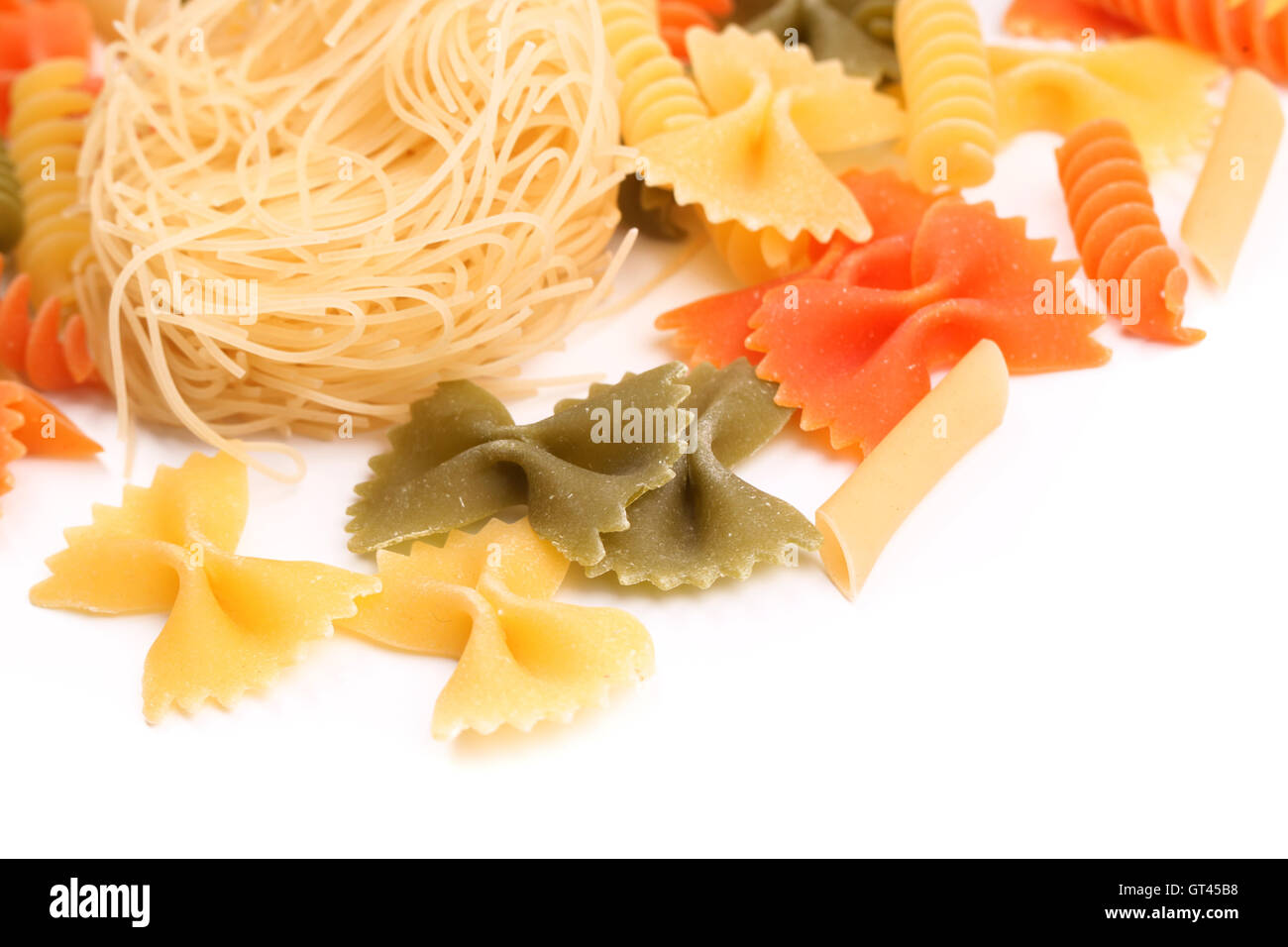 Different pasta in three colors Stock Photo - Alamy