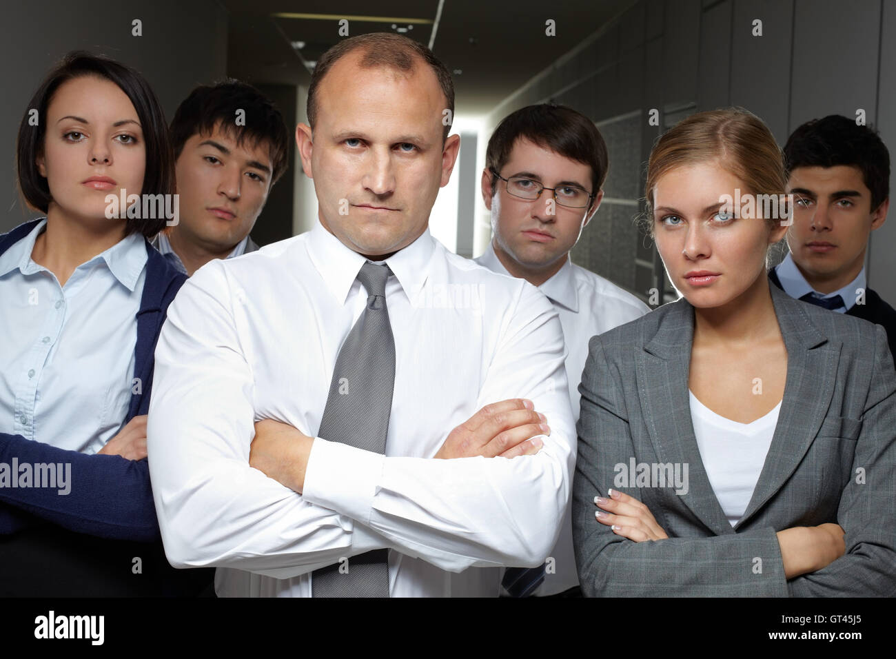 Businesswoman intimidating at employees hi-res stock photography and ...