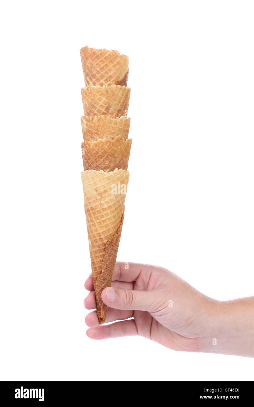 Hand hold stake of wafer cup for ice-cream Stock Photo - Alamy
