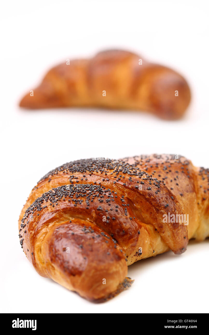 Appetizing croissants with poppy Stock Photo - Alamy