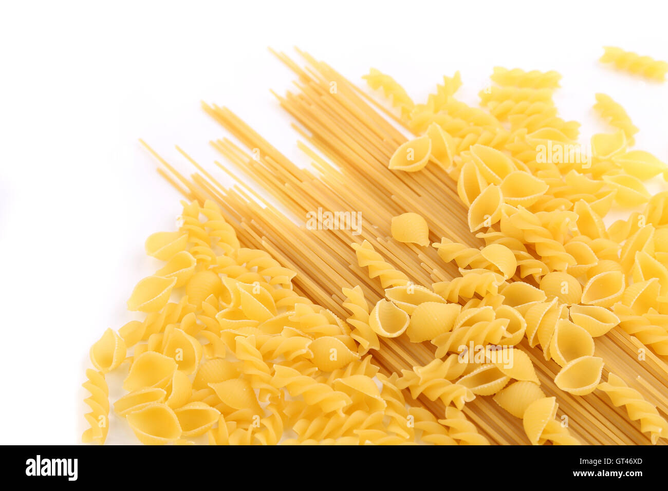 Yellow Italian pasta in different forms Stock Photo - Alamy