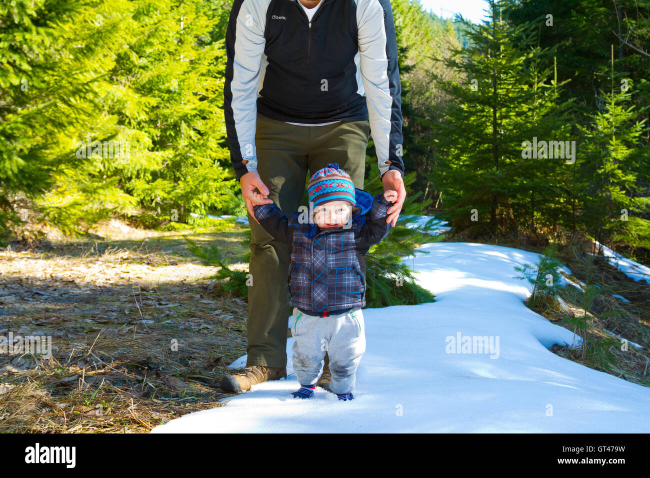 Father and Son in Forest Stock Photo - Alamy