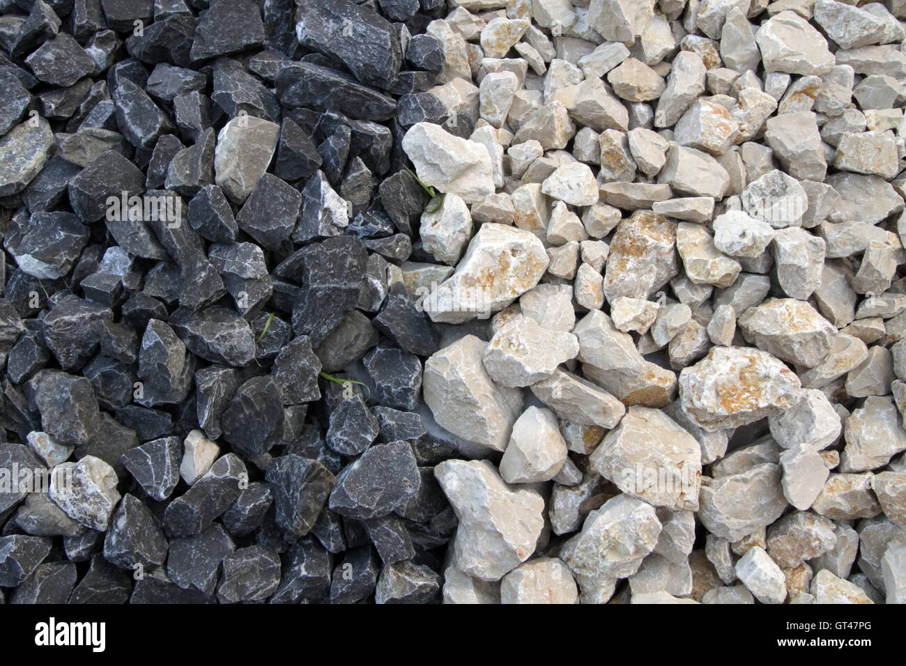 Two colors pebbles background texture Stock Photo - Alamy