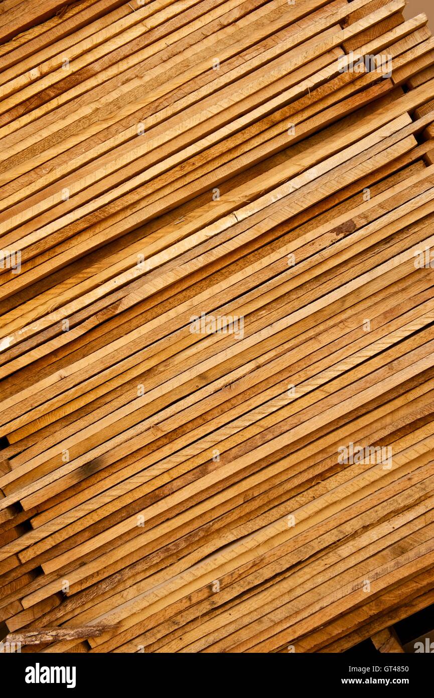 Stack of Rough Cut Wood Lumber on Angle Stock Photo - Alamy