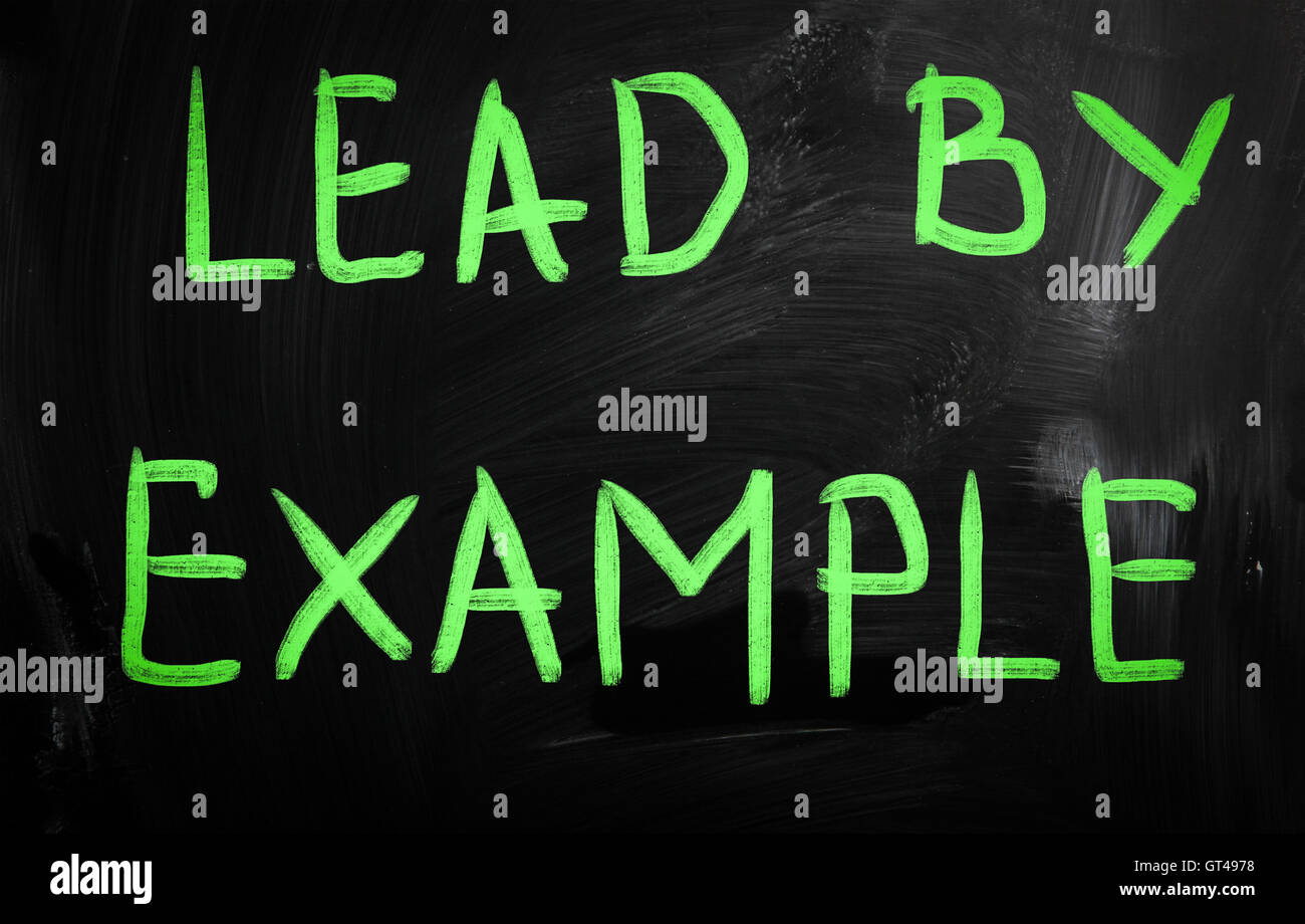 Lead by example handwritten with white chalk on a blackboard Stock ...