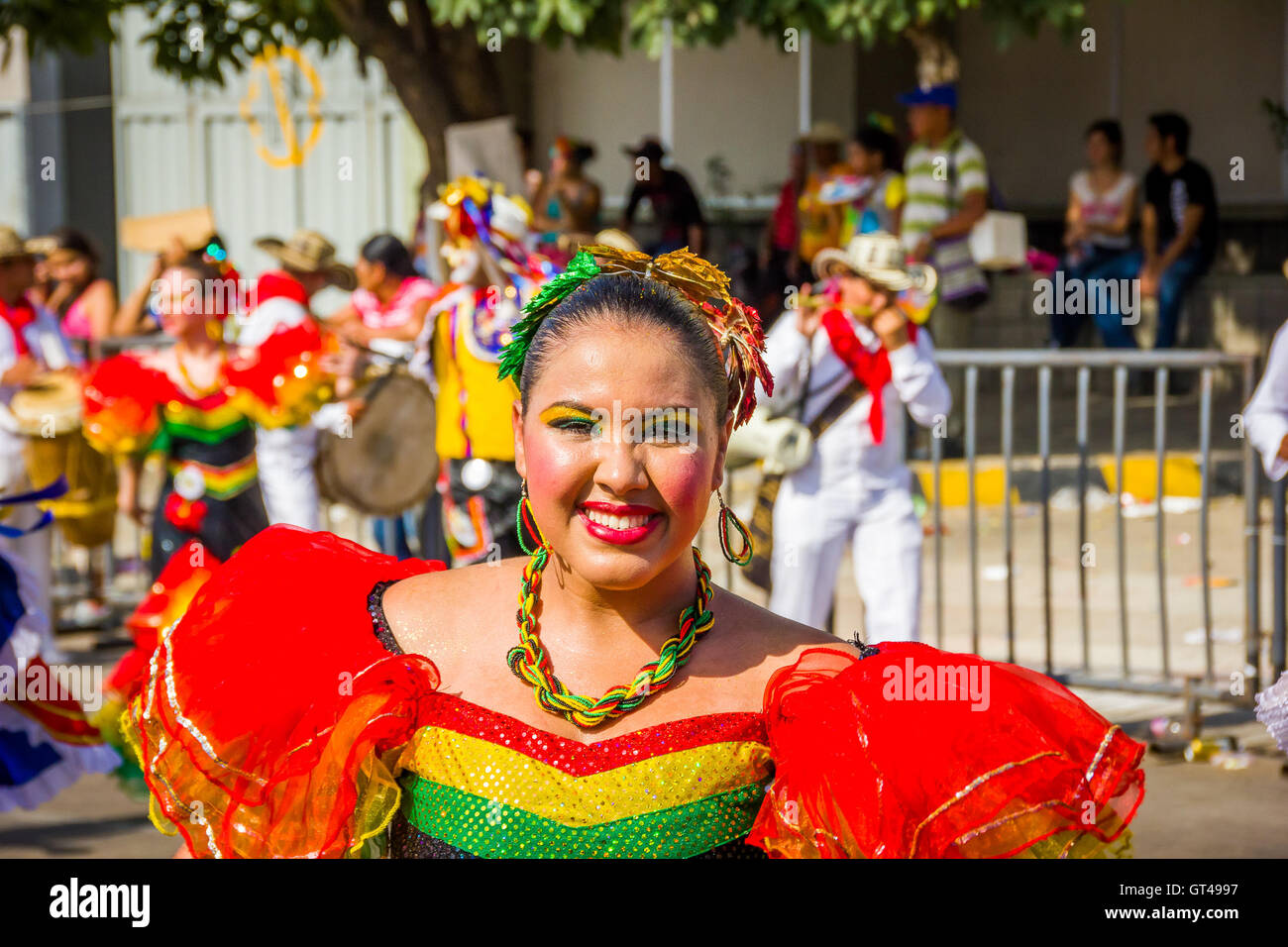 Performers with colorful and elaborate costumes participate in C Stock ...