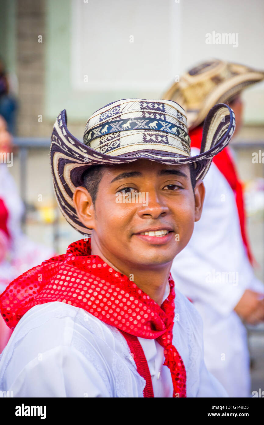 Performers with colorful and elaborate costumes participate in C Stock ...