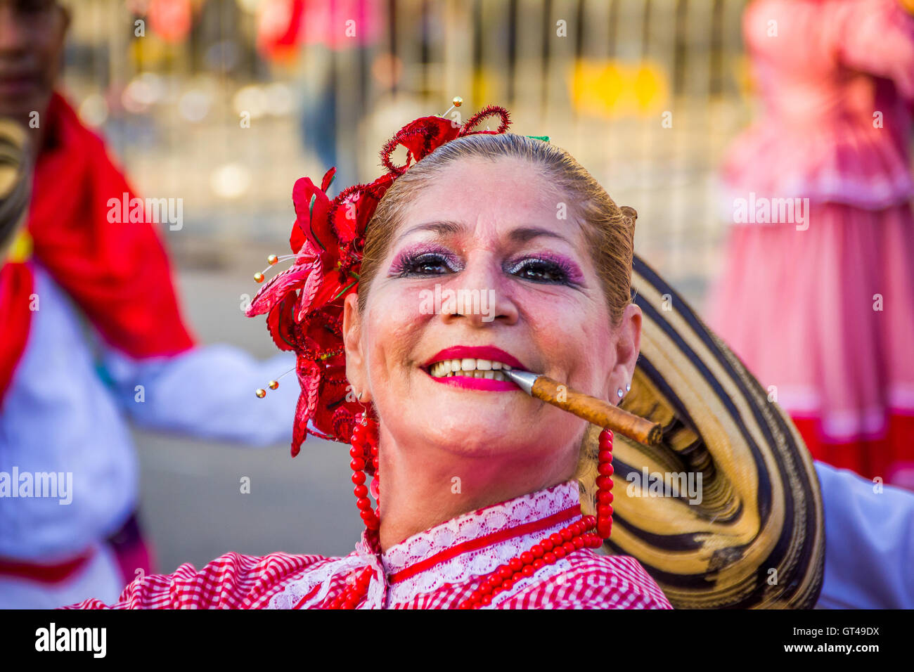 Performers with colorful and elaborate costumes participate in C Stock ...