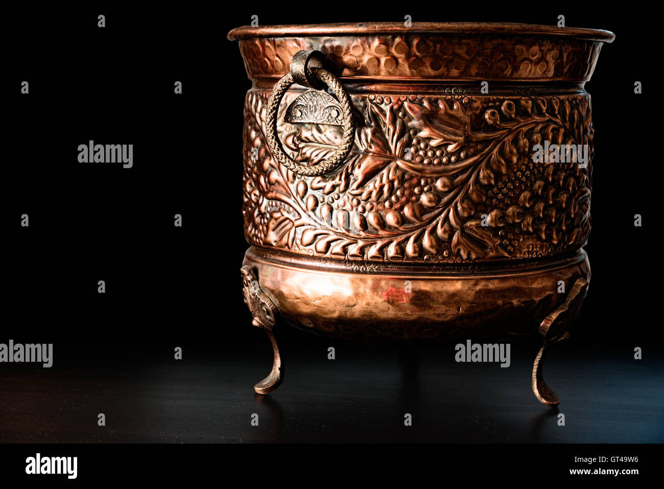 Antique art objects - medieval cauldron Stock Photo - Alamy