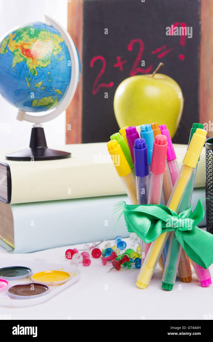 Felt-tip pens, paint and blackboard Stock Photo - Alamy