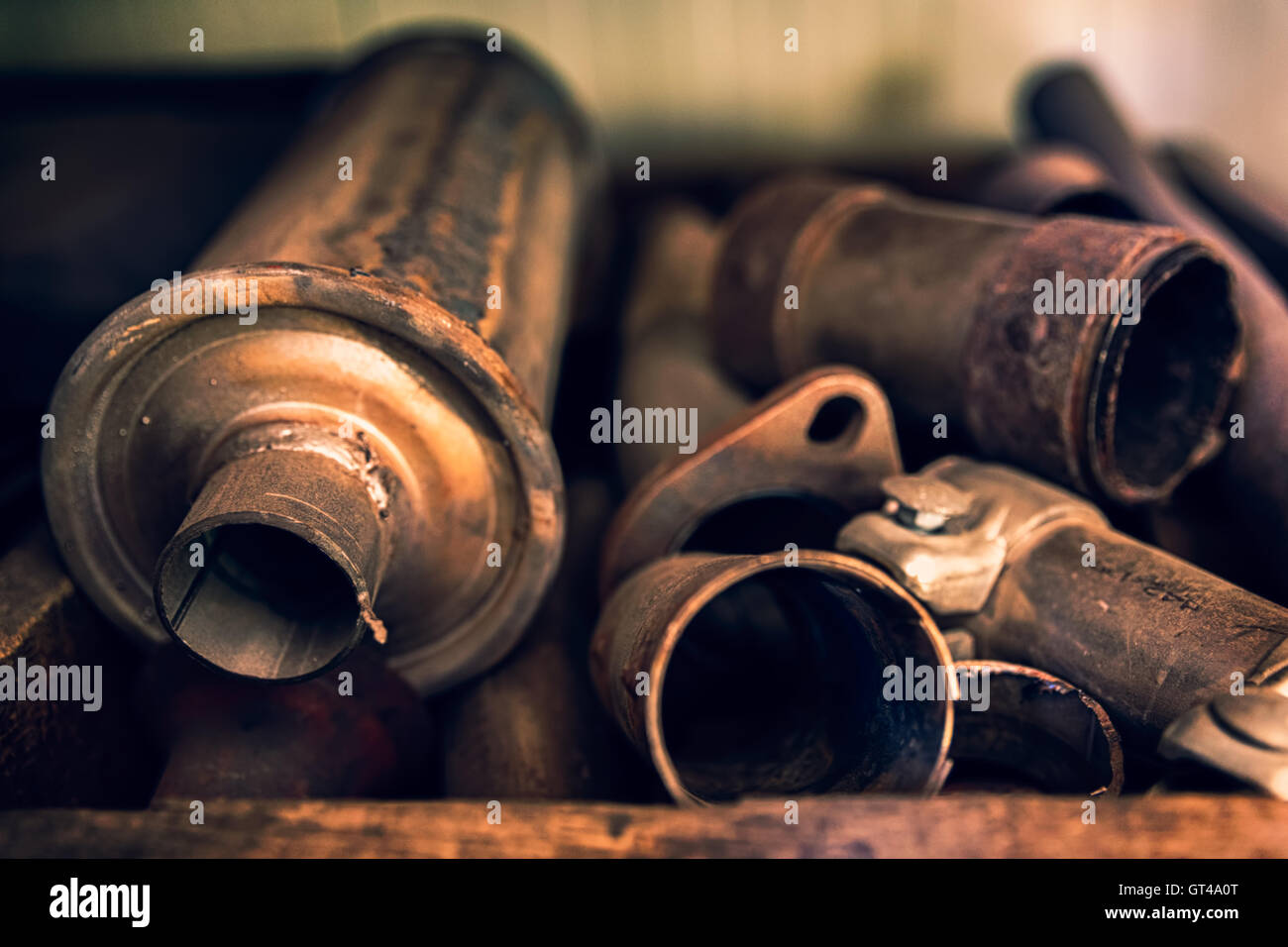 Old and rusty car parts in a junkyard Stock Photo - Alamy