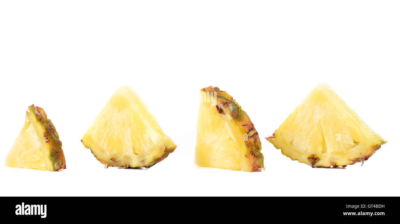Quarters of slices pineapple Stock Photo - Alamy