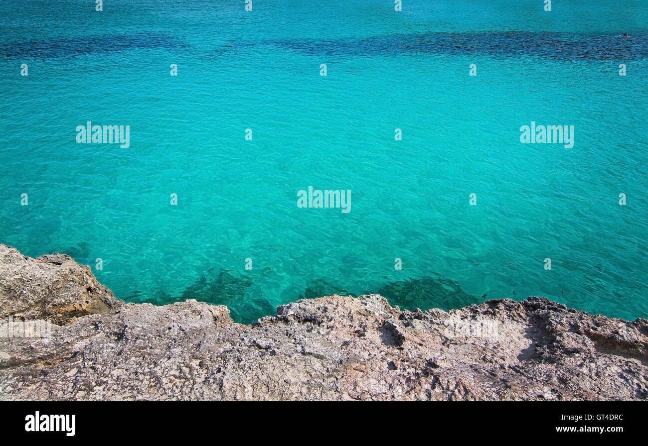 Rock and clear turquoise water background in Mallorca, Balearic islands ...