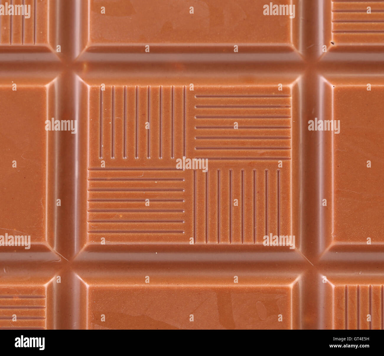 Milk chocolate bar as background Stock Photo - Alamy