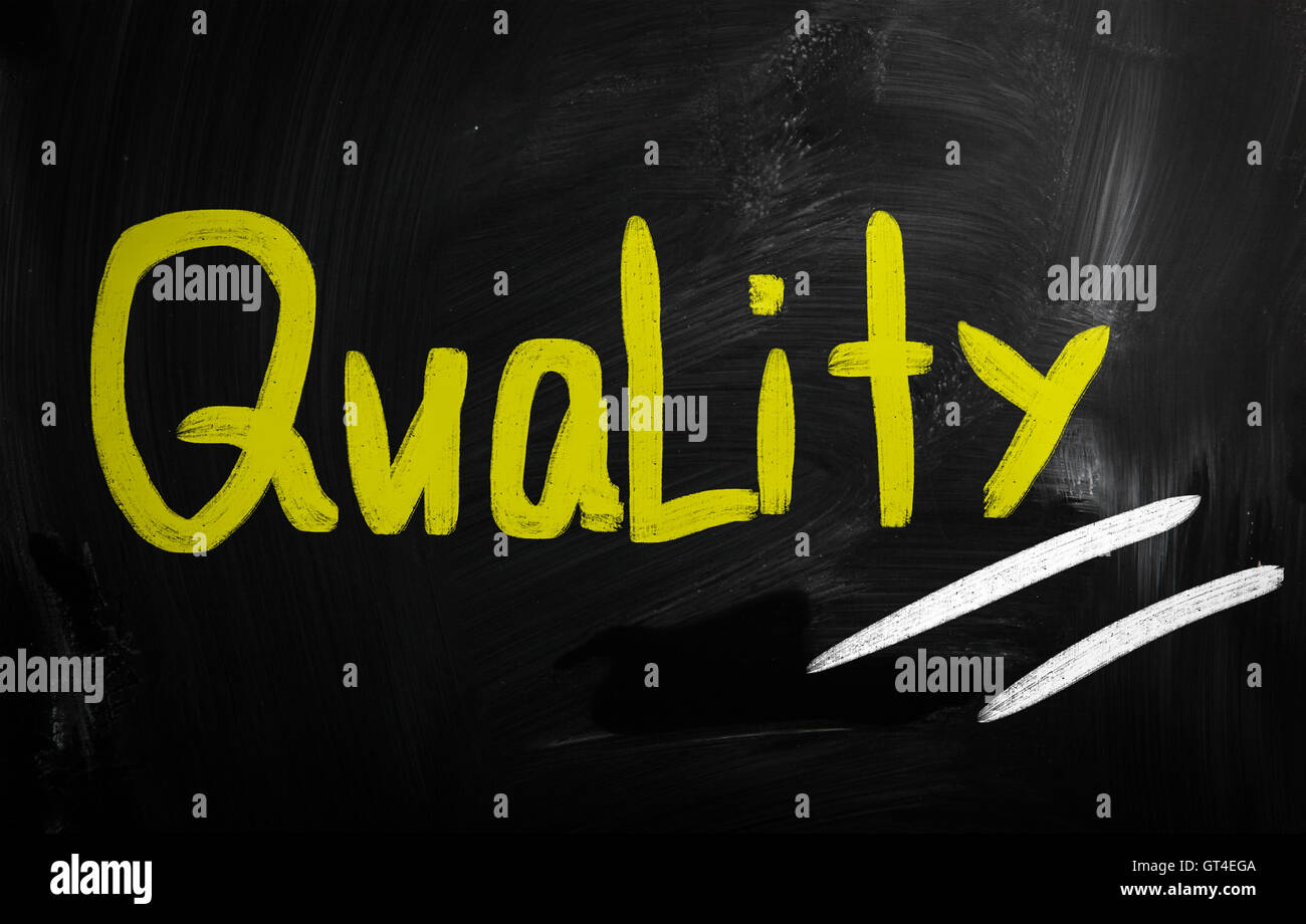 Quality handwritten with white chalk on a blackboard Stock Photo - Alamy