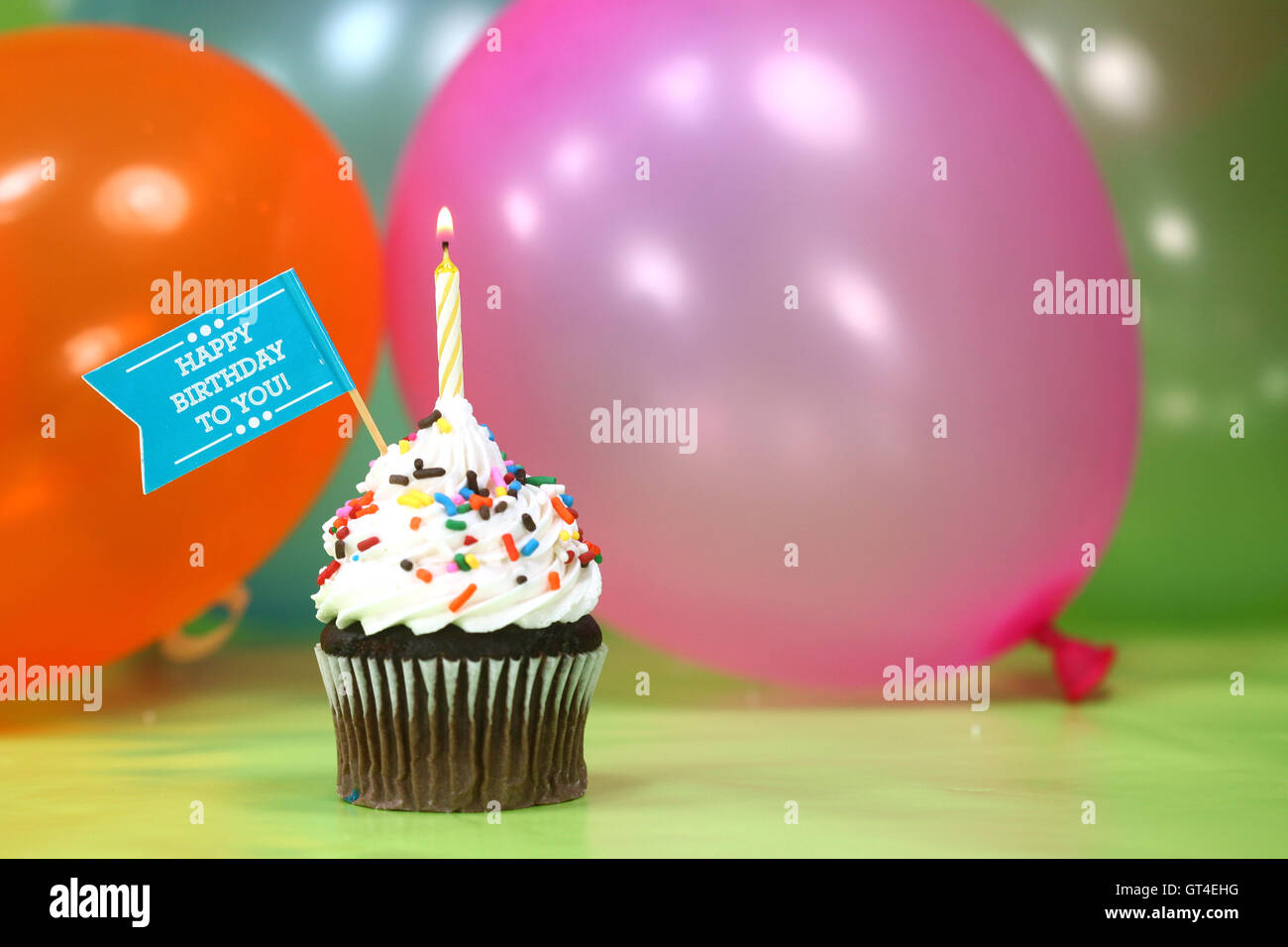 Celebration with Balloons Candles and Cake Stock Photo - Alamy