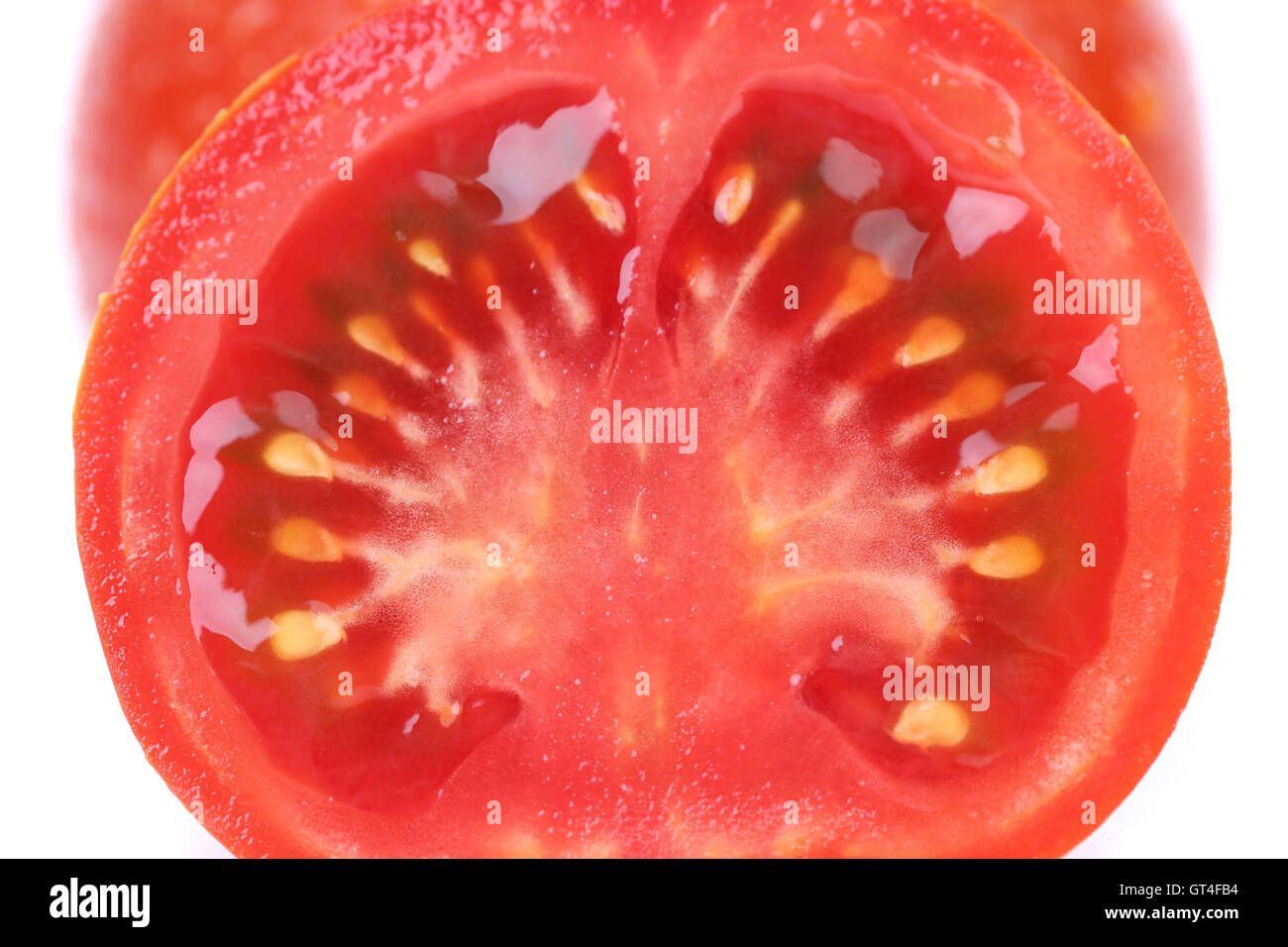 slice of tomato isolated on a white background Stock Photo - Alamy